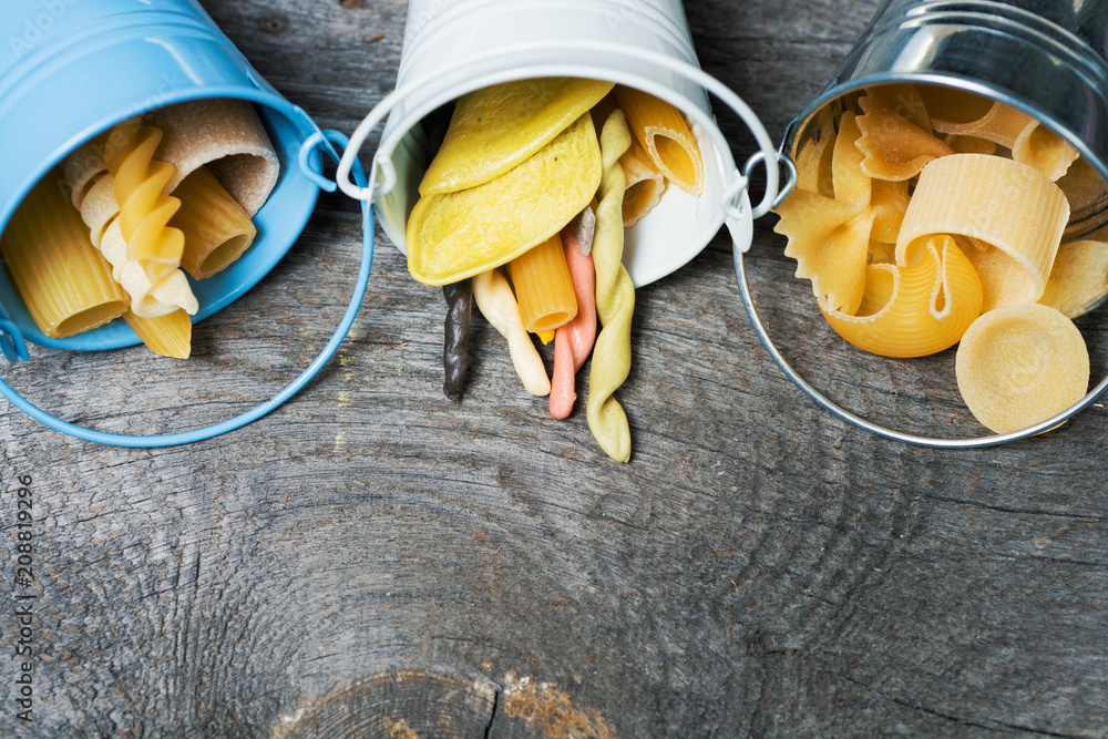 composition of raw Italian pasta Different shapes In decorative buckets ...