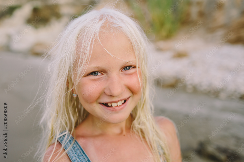 Little blonde girl portrait Stock Photo | Adobe Stock