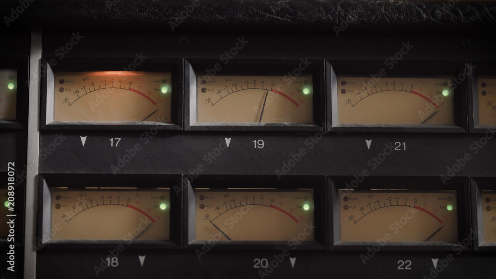 old displays of professional analog vu metres in a recording studio ...