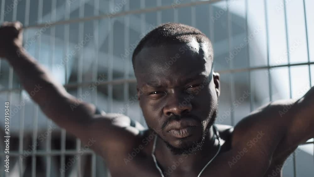 Confident and angry african american man looking at camera - outdoor ...