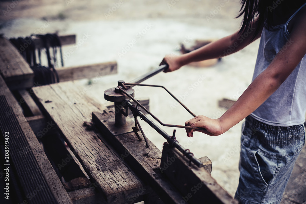 Little girl labor working in commercial building structure, World Day ...