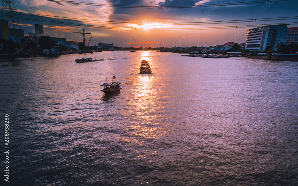 BANGKOK, THAILAND - 2018 JUNE 6: The tug boats towing a big barge with ...
