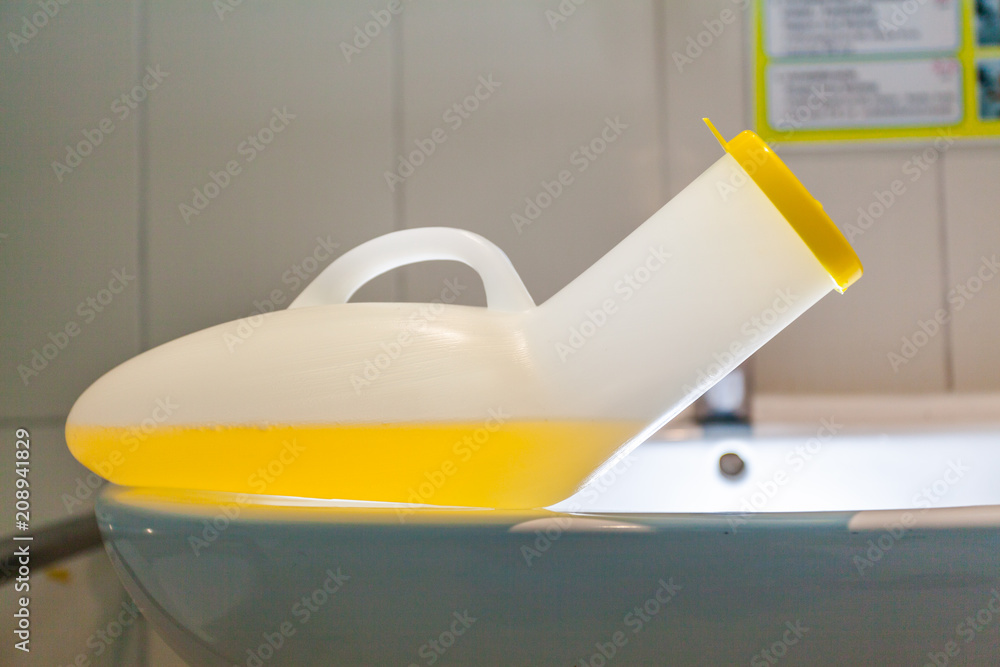 Plastic cylinder To keep the urine of the patient in hospital To be ...