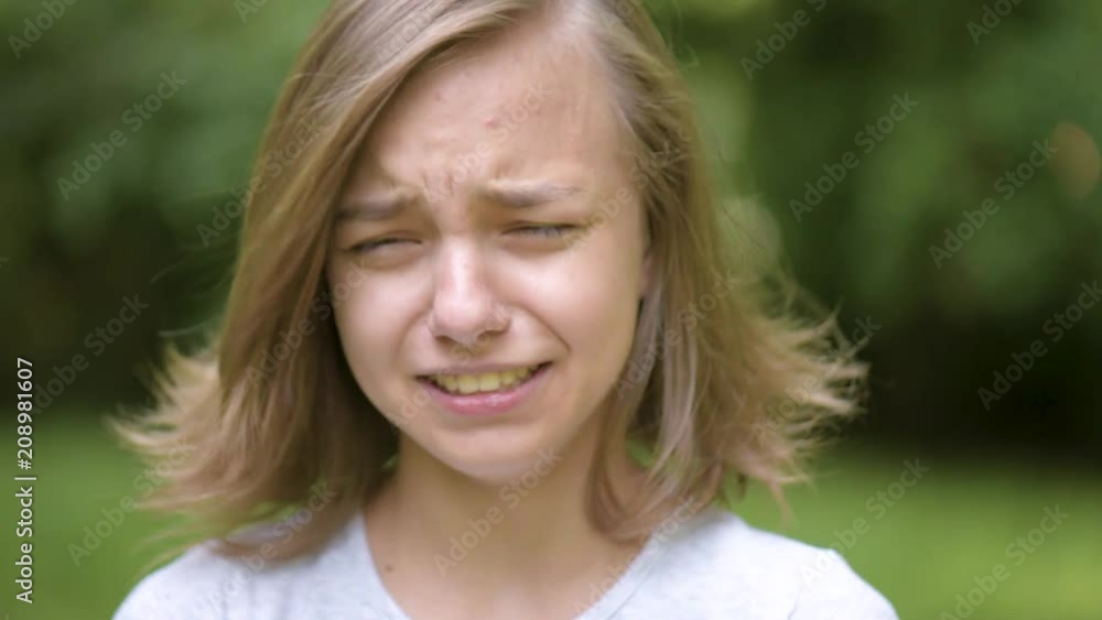 Close up emotional portrait of caucasian sad crying teen girl. Unhappy ...