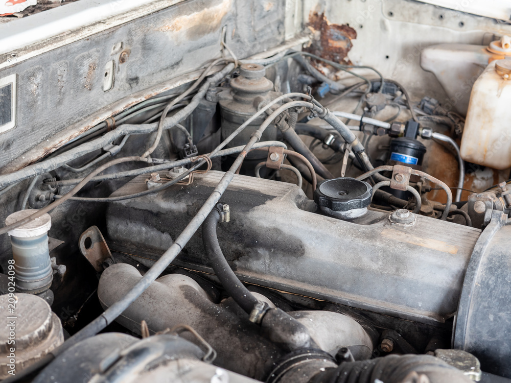 Old and dirty diesel fuel system car engine in the garage. Stock Photo ...