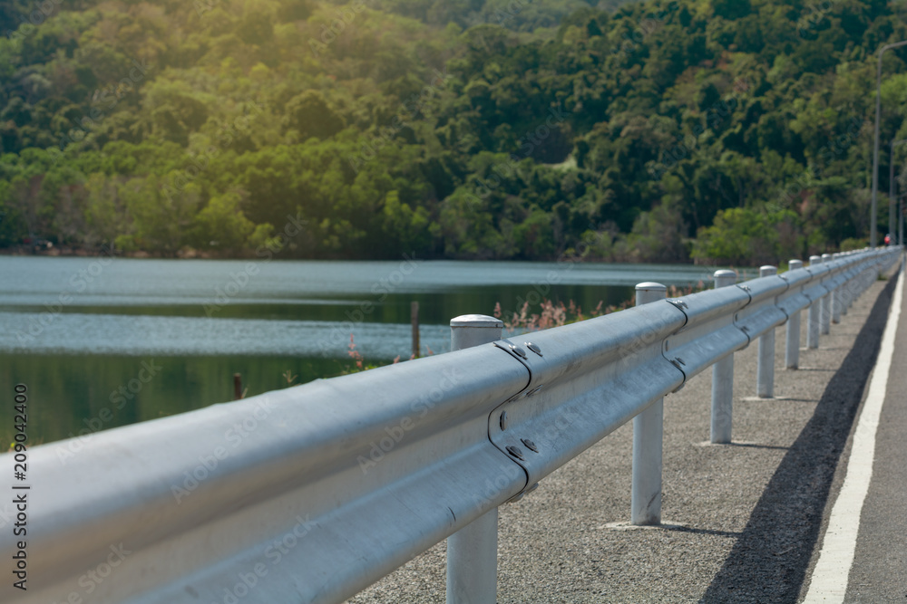Guard rail ..Road barrier on the top of Bang waad dam straight to the ...