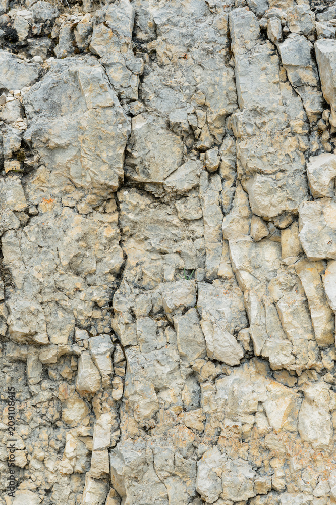 Textured stone background Rubble ballast in natural form in the rock ...