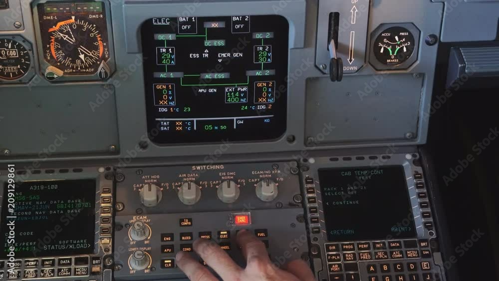 The cockpit of the aircraft. The pilot checks the electronics of the ...