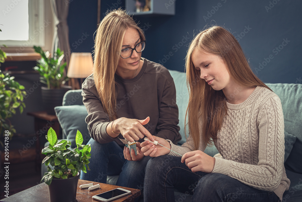 Periods. Menstrual cycle. Mother explains daughter the menstrual cycle ...