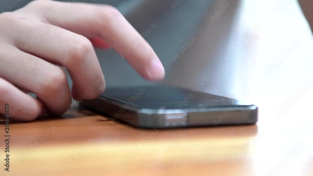 Fingers make gestures touching and swiping the screen of a modern ...