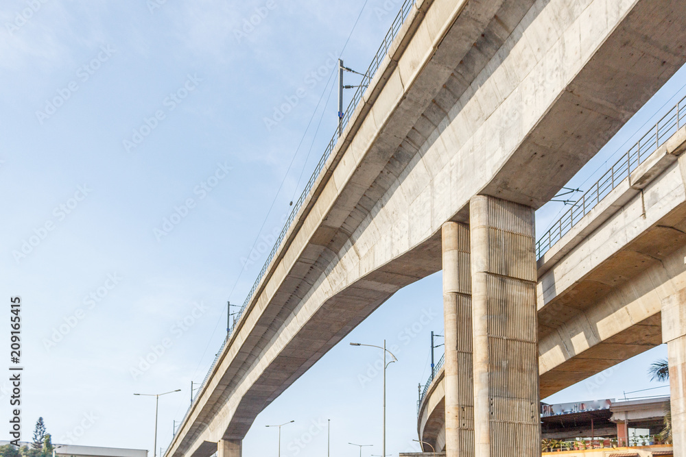 double berth metro train bridge construction and train seen moving ...