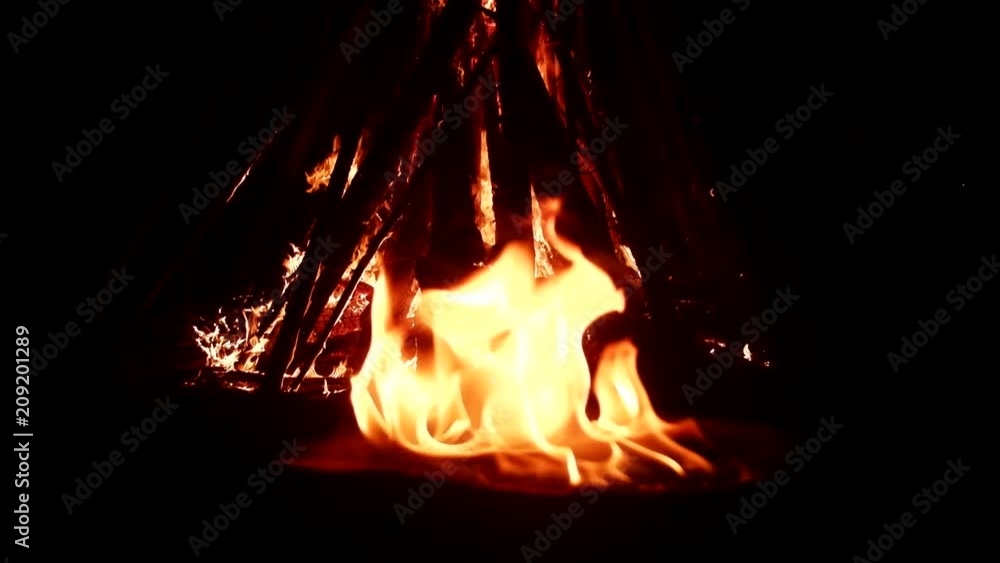 Huge fire at night attractive bright and magical, two levels of fire ...