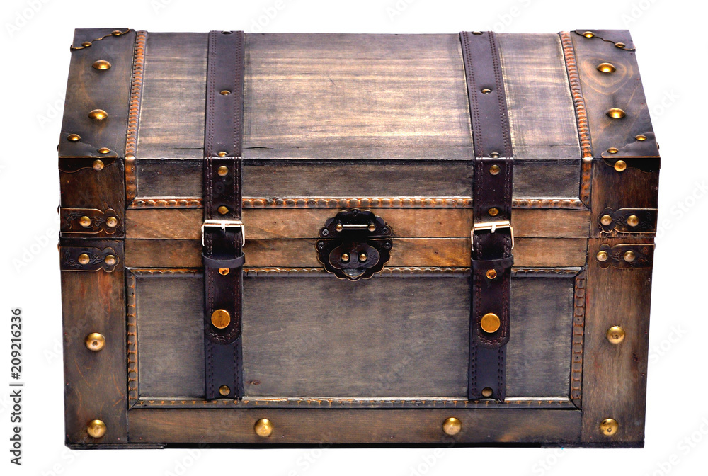 Old wooden chest with ornamental forging and leather straps isolated on ...