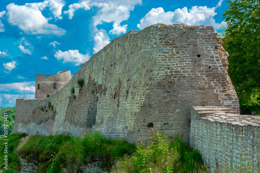 Historical buildings. The ancient fortress with towers and walls that ...
