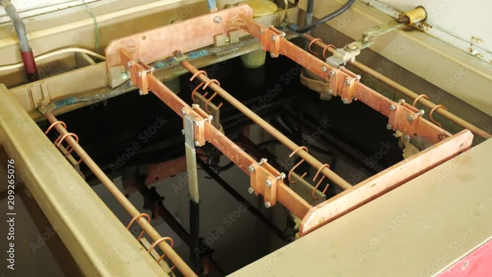 Galvanic bath, Engineering production. Circuit board in galvanic bath ...