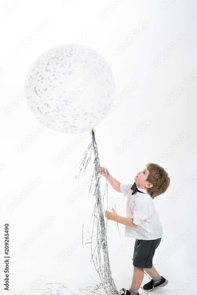 Childhood. Kid with big balloon. Party mood. Celebration concept. Big ...