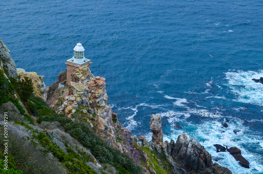 Small lighthouse at the tip of Cape Point. Aerial view of lighthouse ...