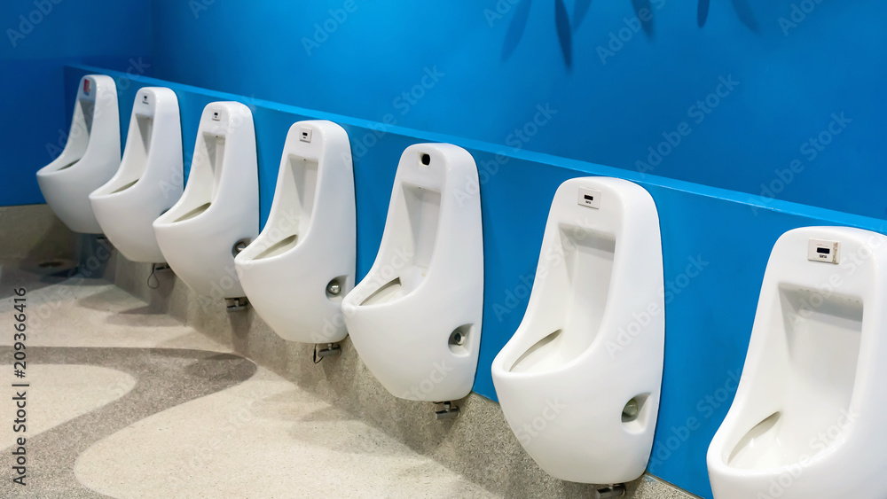 Foto de Urinals for men only. do Stock | Adobe Stock