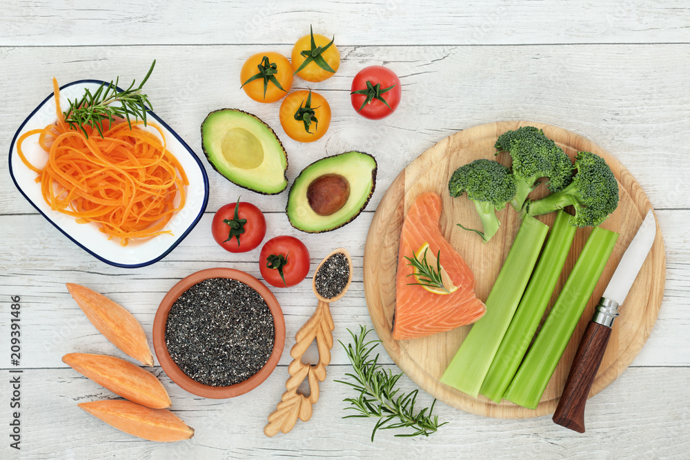 Health food for a healthy life with fresh fish, nuts, seeds, grains ...