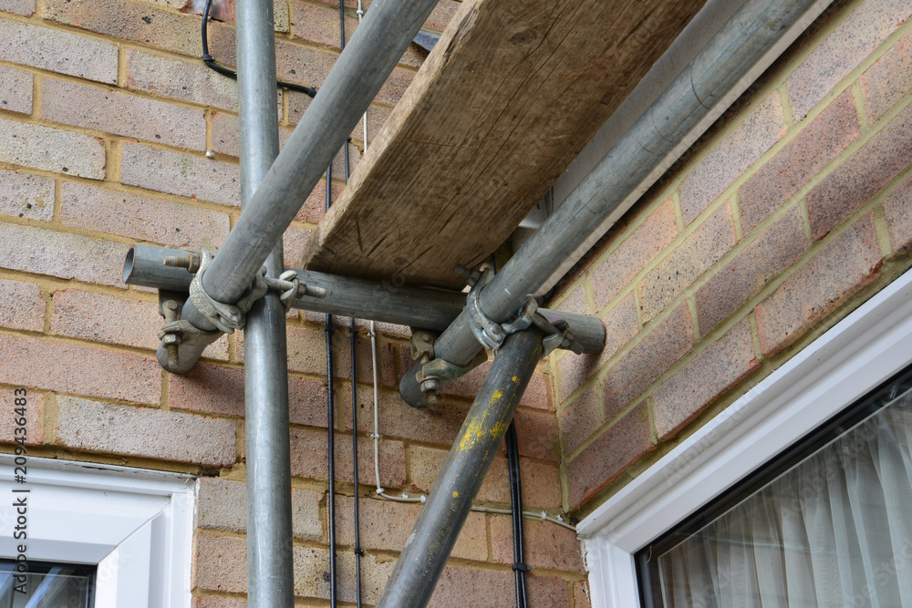 Scaffolding pipe crossing on a Scaffold tower looking up from ...