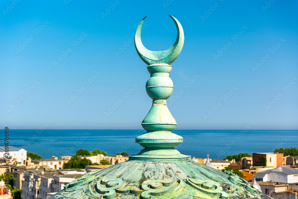 Crescent moon steeple on top of the Grand Mosque, in Constanta, Romania ...