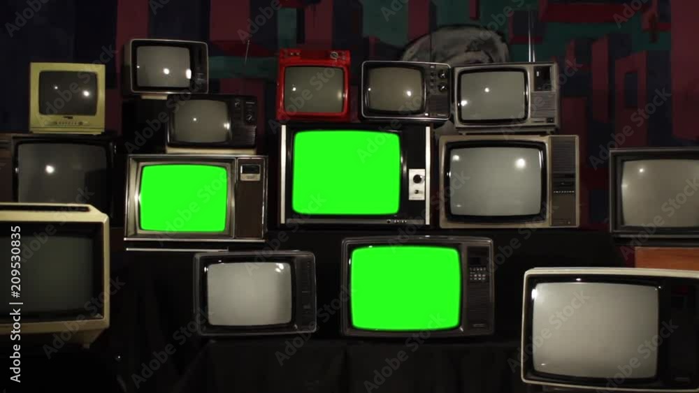 Many Tvs with Green Screens Turning On. Zoom Out. You can replace green ...