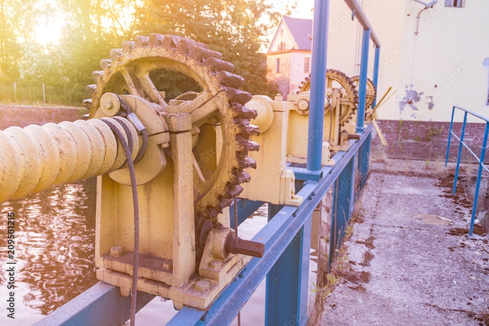Installation for pumping the valve on the dam in the lake, Big old ...