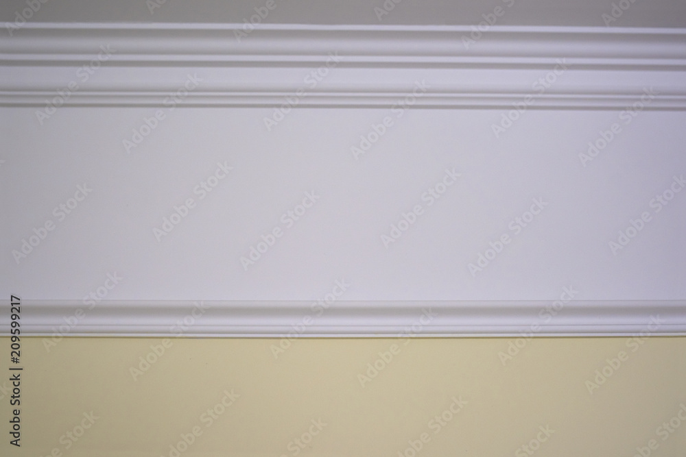 Detail of a flat ceiling skirting, ceiling moldings in the interior ...