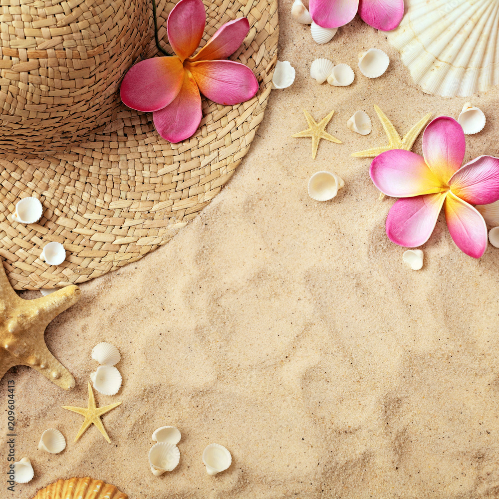 summer background, summer hat, seashells and tropical flowers on sand ...