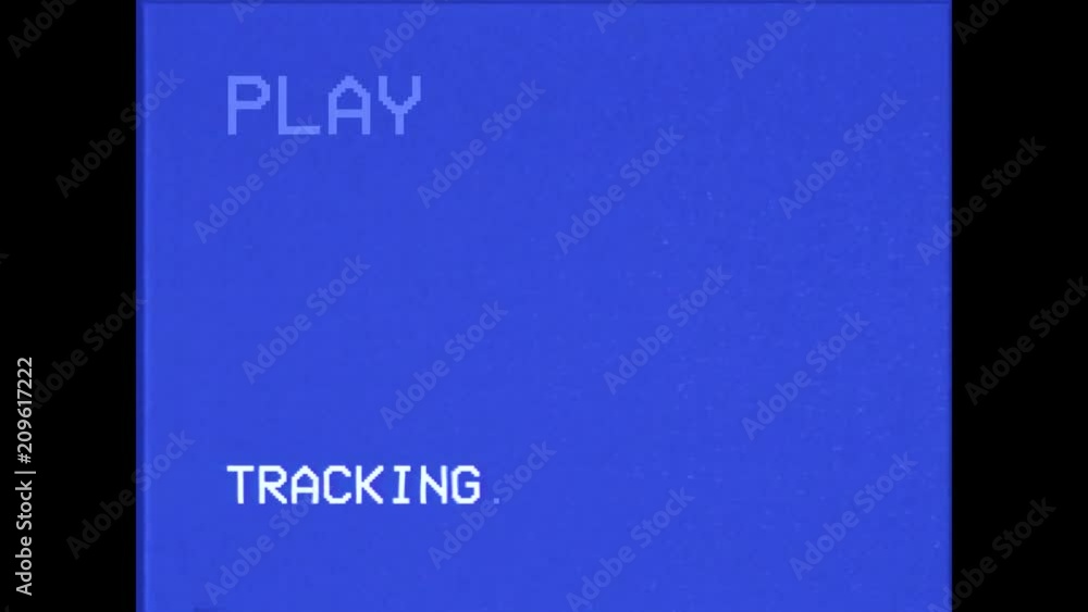 An old bad broken VHS tape playing. Blue screen, four thirds factor ...