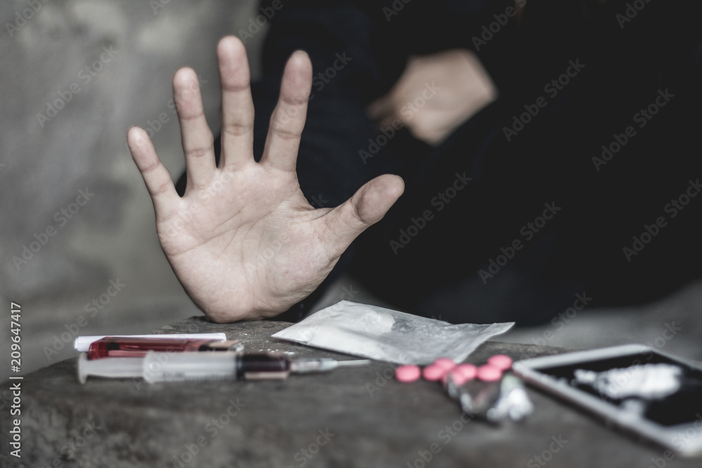 Girl shows palms against drug abuse, The concept of crime and drug ...
