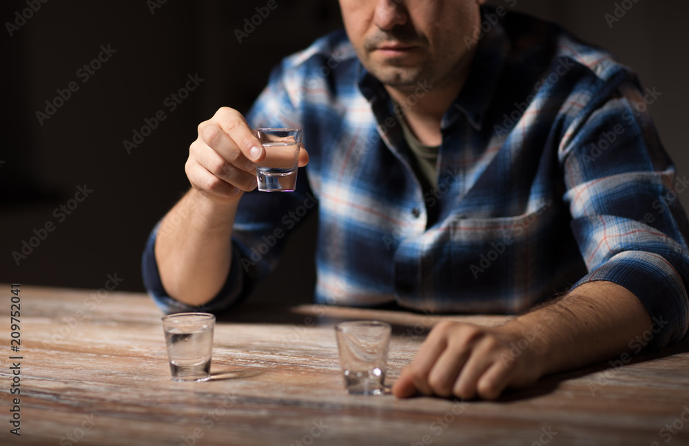 alcoholism, alcohol addiction and people concept - male alcoholic ...