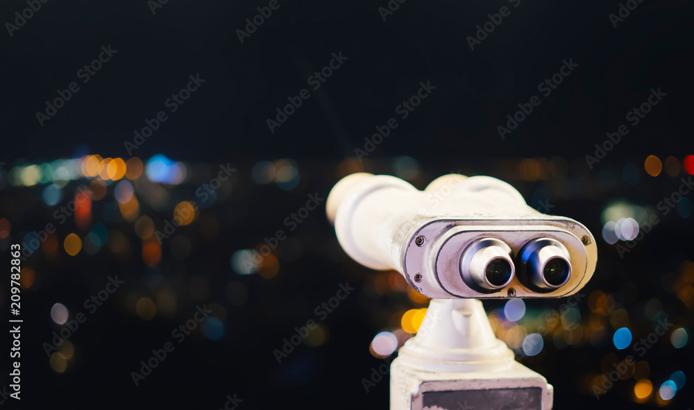 Touristic telescope look at city with view, close up old metal ...