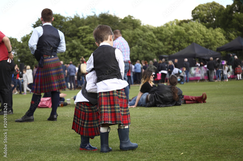 Two boys in kilts at the festival Stock 写真 | Adobe Stock