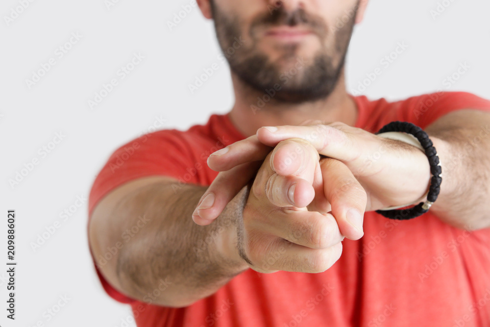 Man pointing pistol-like handgun sign, hand gesture studio shot Stock ...
