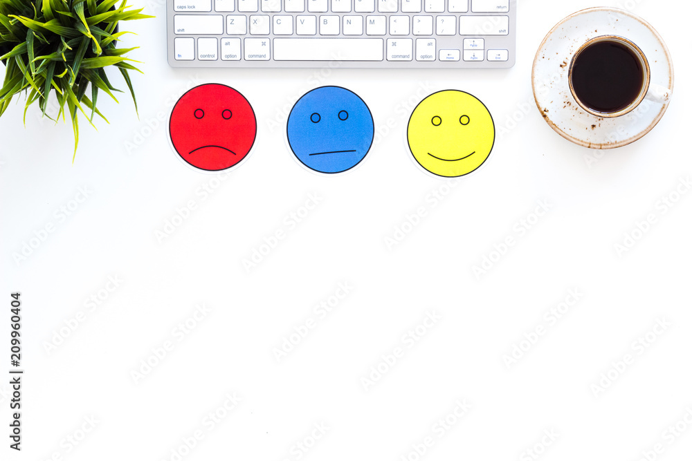 Customer satisfaction concept. Emoji smile, neutral, sad on work desk ...