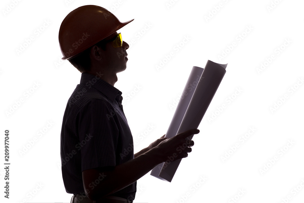 silhouette of male construction engineer with building project, man in ...