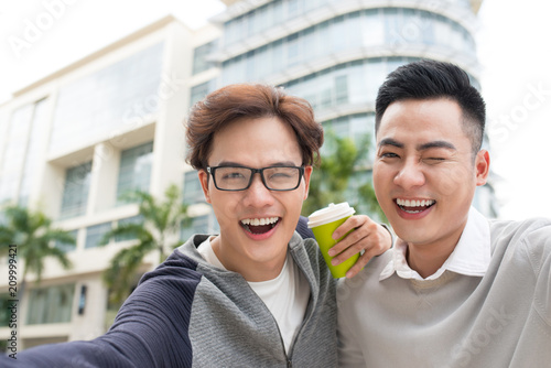 Two Guy Friends Hugging