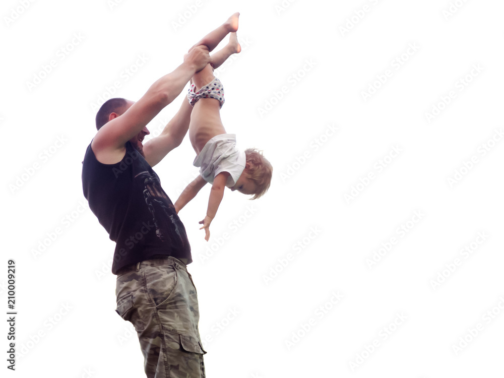 Dad and son fool around, play and play. The father holds the child's ...