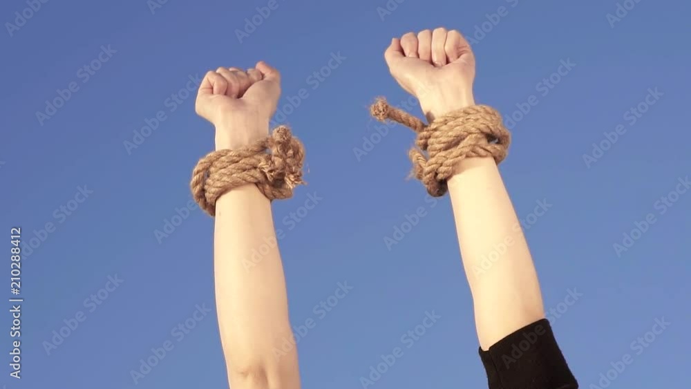 freedom concept hands,torn rope female hand Stock Video | Adobe Stock