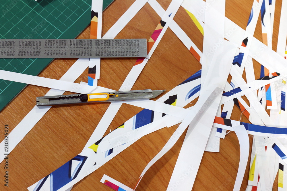 A pile garbage of scrap paper is cut with a knife cutter, Destruction ...