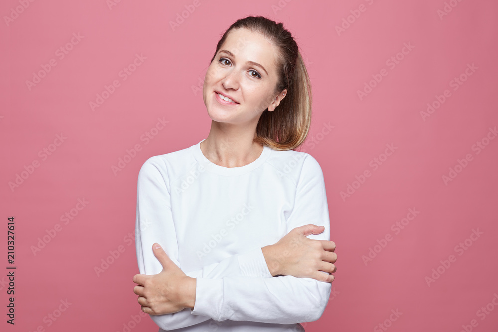 People, happiness and facial expressions concept. Pretty young woman ...