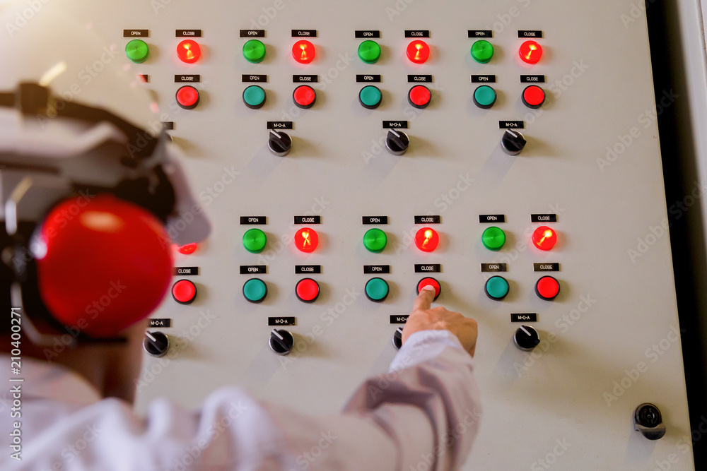 Foto de Engineer is check Electrical control panel in factory / Control ...