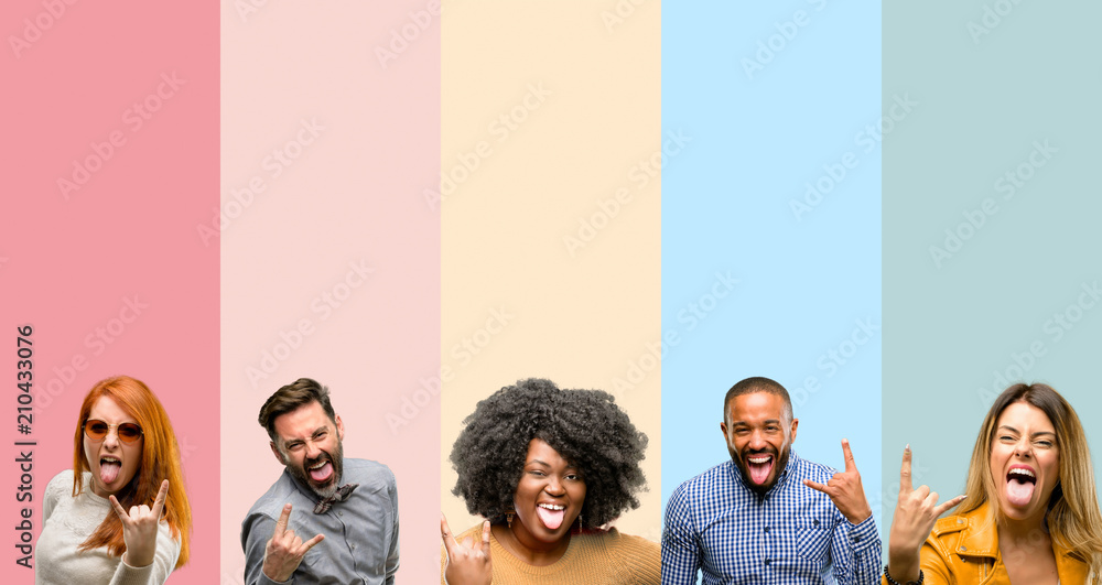 Cool group of people, woman and man making rock symbol with hands ...