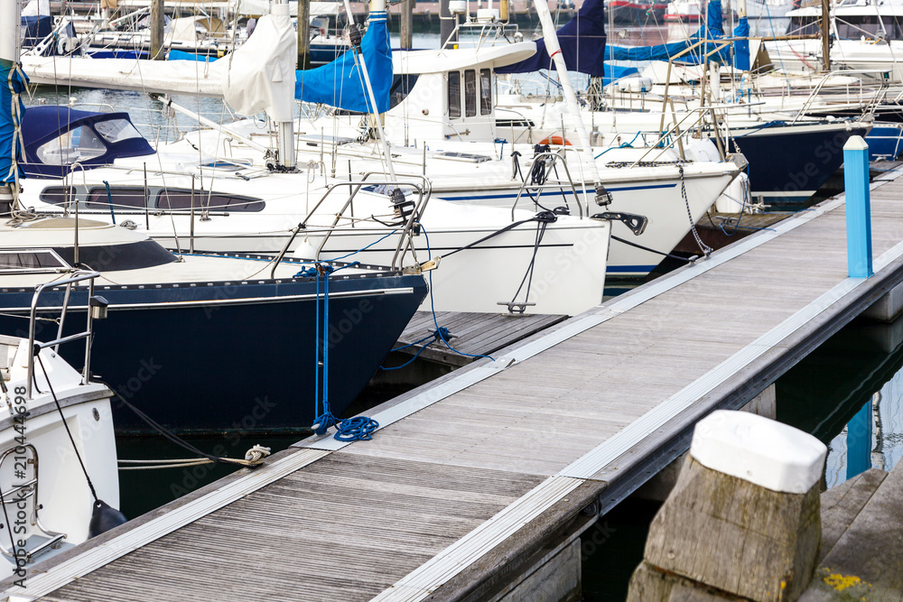 Yacht reflection north dock boat seaport sky blue sea background sunset ...