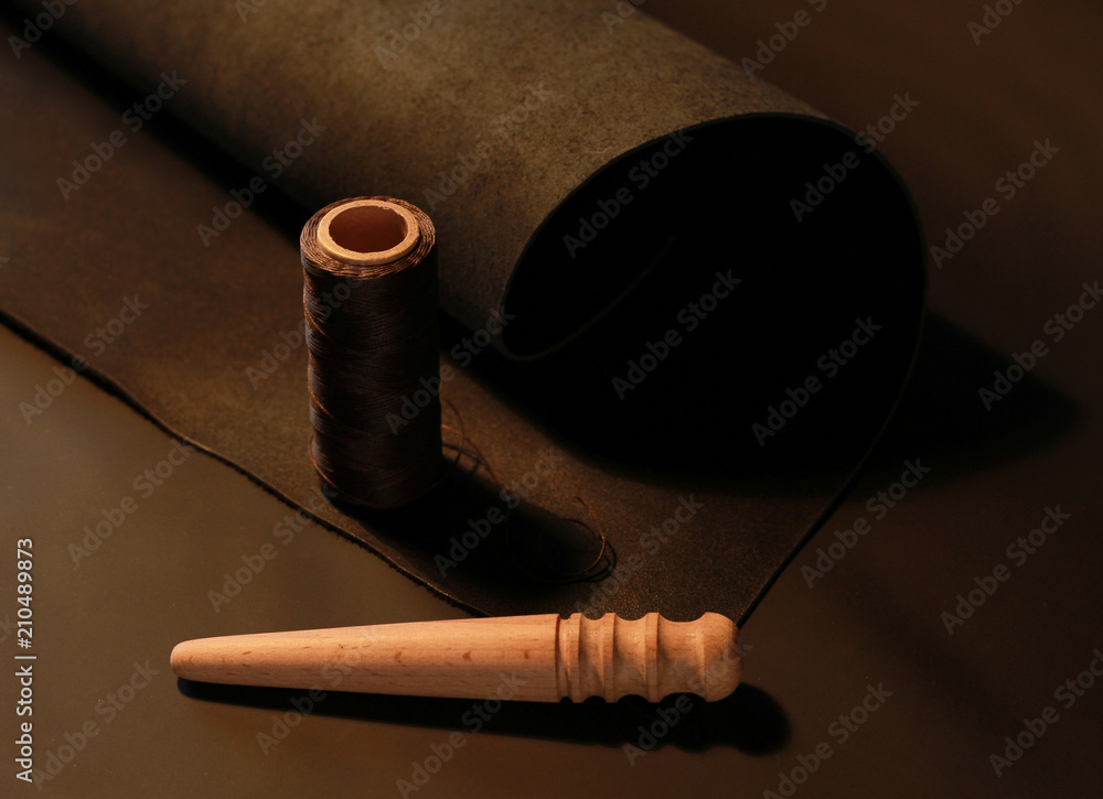 Black skin, slicker lies on the skin, waxed thread. Side view Stock ...