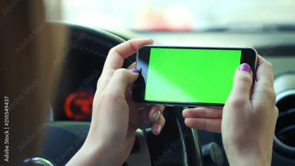 Girl Driver closeup, greenscreen in the car, urban city background ...