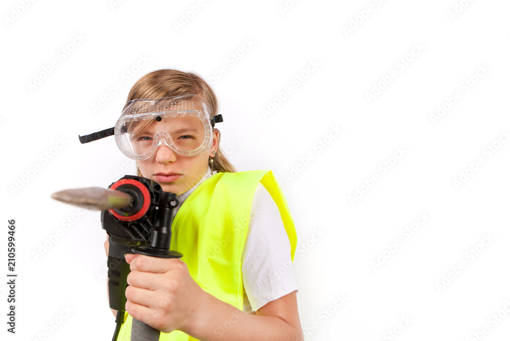 Cute young girl wearing safety vest and safety goggles posing with a ...