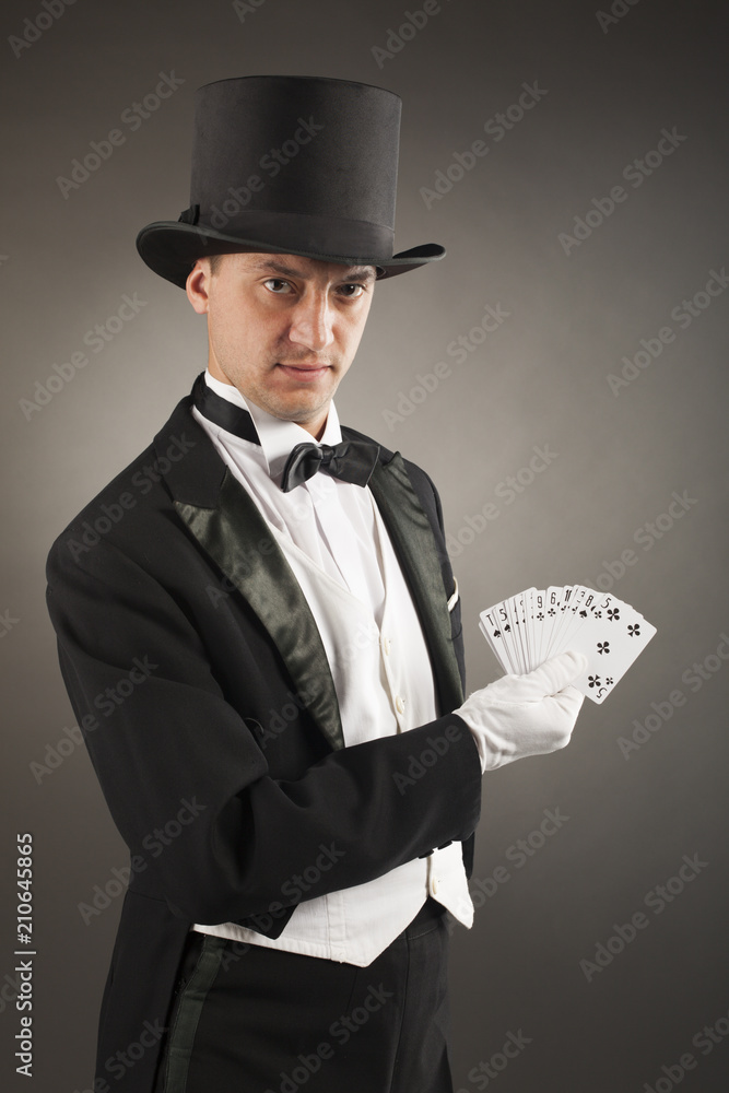 Magician Holding Cards