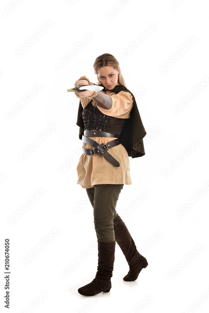 full length portrait of girl wearing brown medieval costume,. standing ...